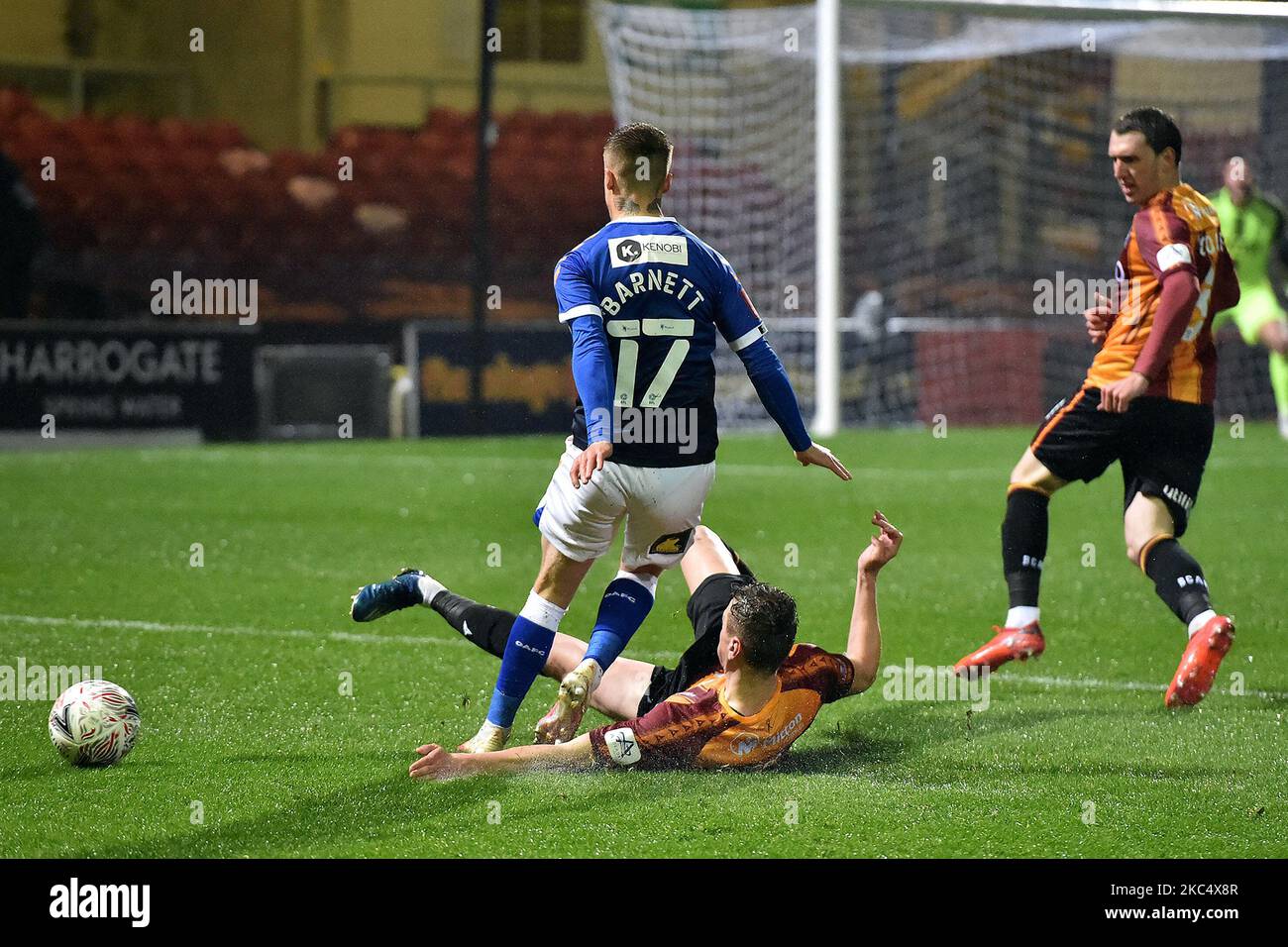 Oldham Athletic's Jordan Barnett tussles with Bradford City's Paudie O ...