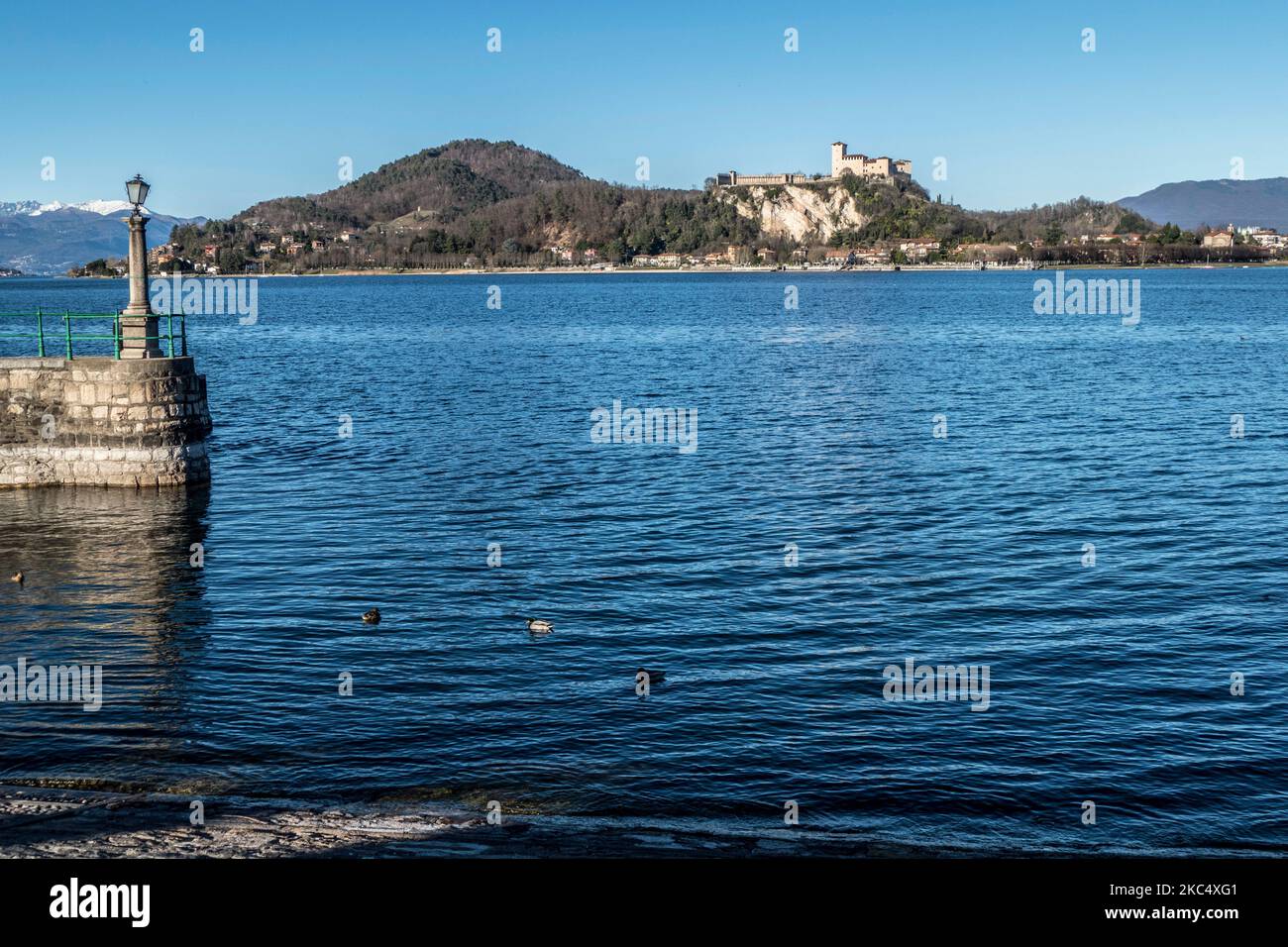 Landscape of the castle of Angera and the city from the port of Arona ...