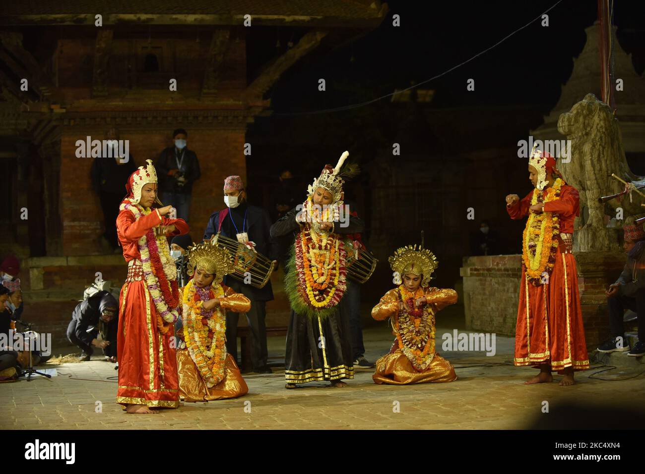 A group of artists performing Kartik Naach festival at Patan Durbar ...