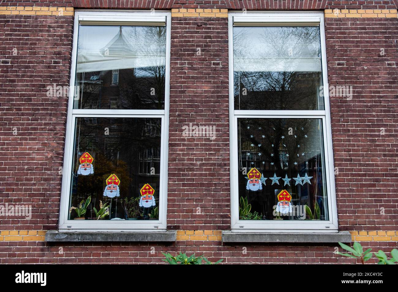A couple of windows from an elementary school are seen decorating with ...