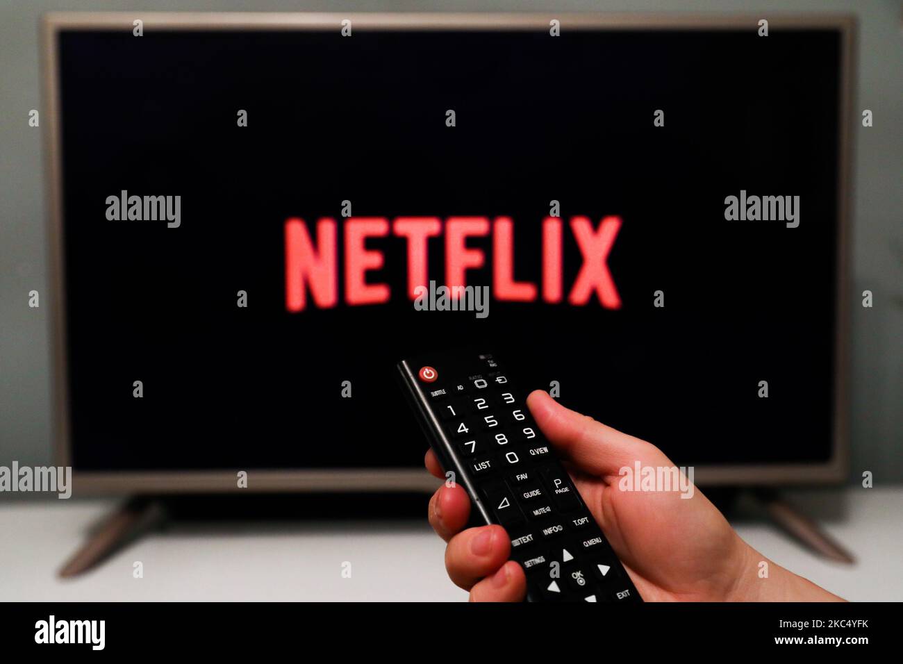 Netflix logo is seen displayed on a tv screen in this illustration ...
