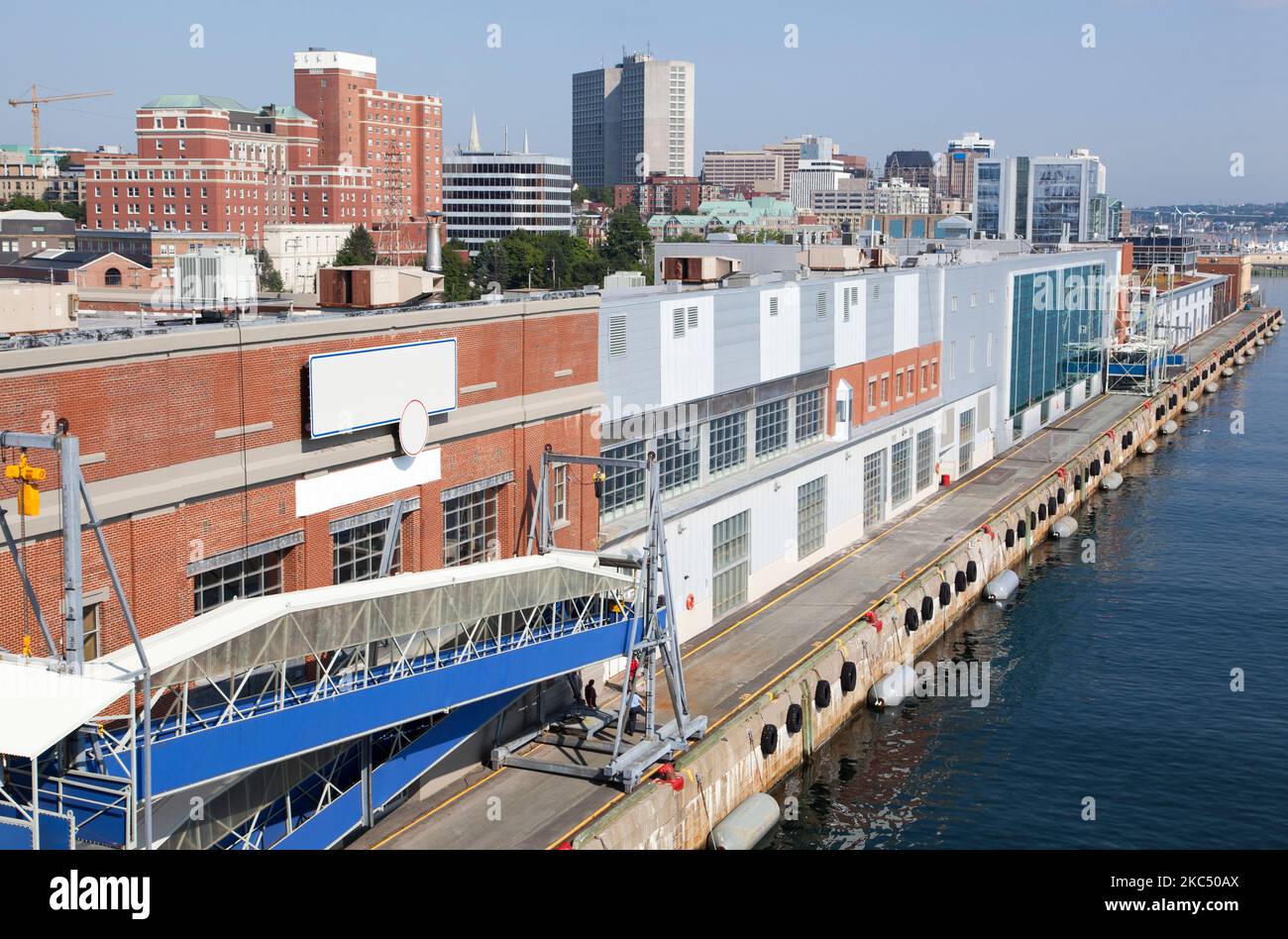 The morning view of an empty pier with Halifax downtown skyline in a ...