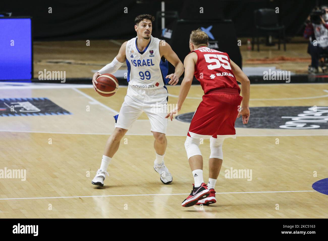 99 Yiftah Ziv of Israel defended by 55 Lukasz Koszarek of Poland during ...