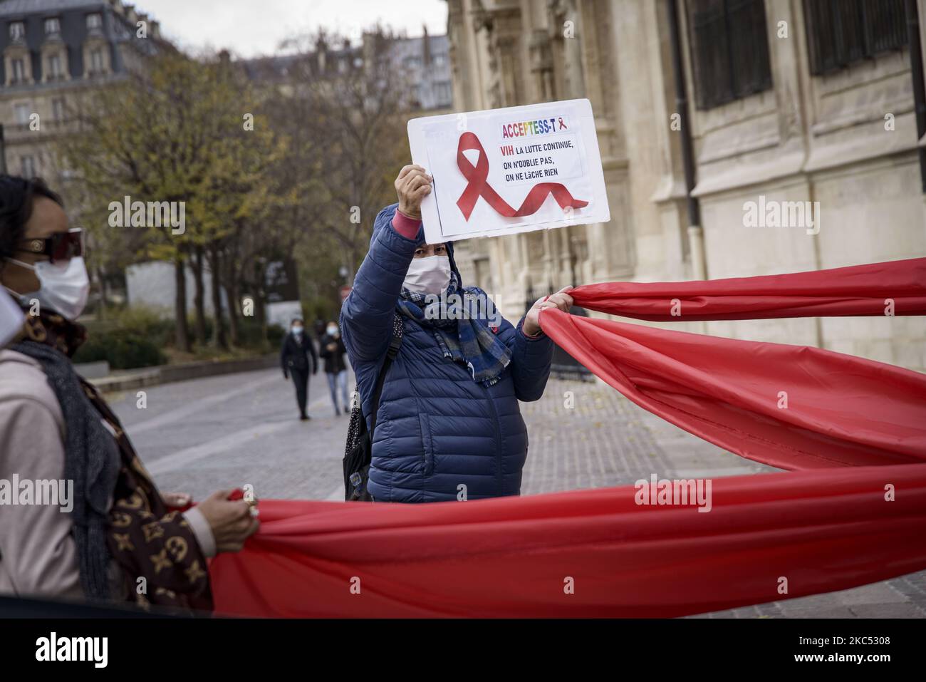 Act Up activists gather to mark World AIDS Day in Paris. Paris, 1st of ...