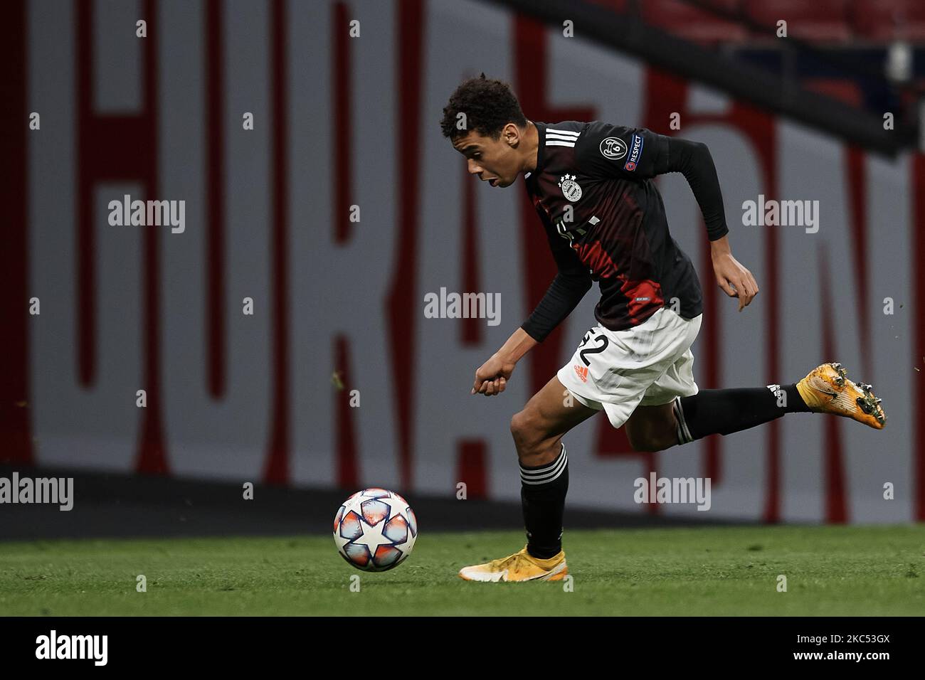 Jamal Musiala of Bayern runs with the ball during the UEFA Champions ...