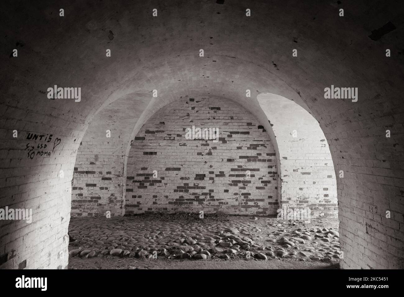 The arches in an old, historical building, grayscale, Lithuania Stock ...