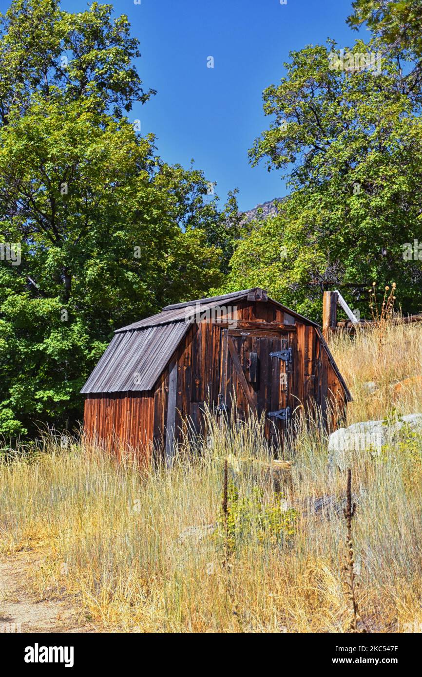 Old abandoned red wood cabin on Hamongog hiking trail below Lone Peak ...