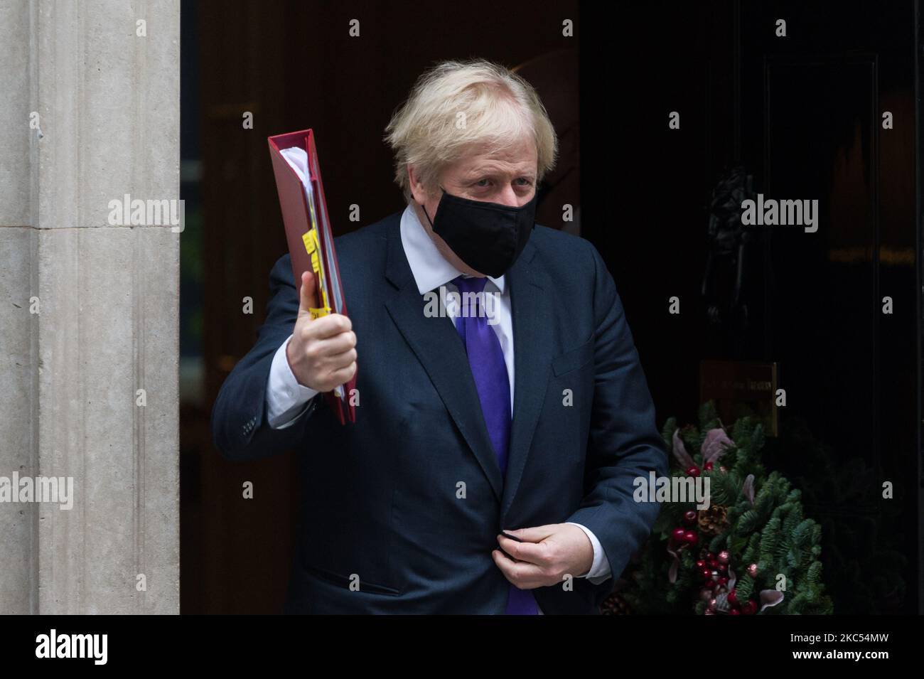 British Prime Minister Boris Johnson leaves 10 Downing Street for PMQs ...