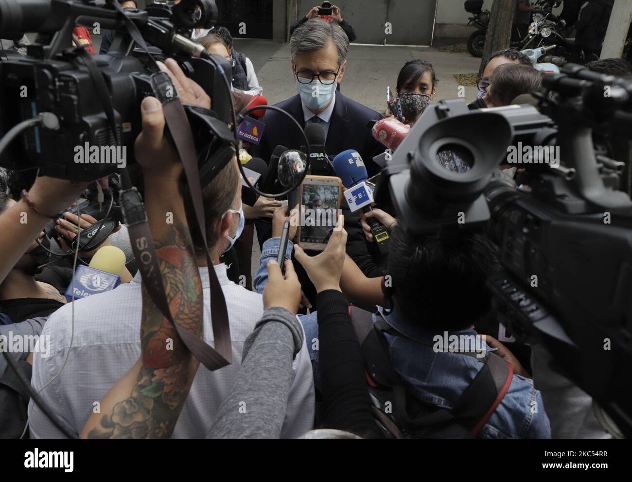 Members of the French community in Mexico outside the French Embassy in ...