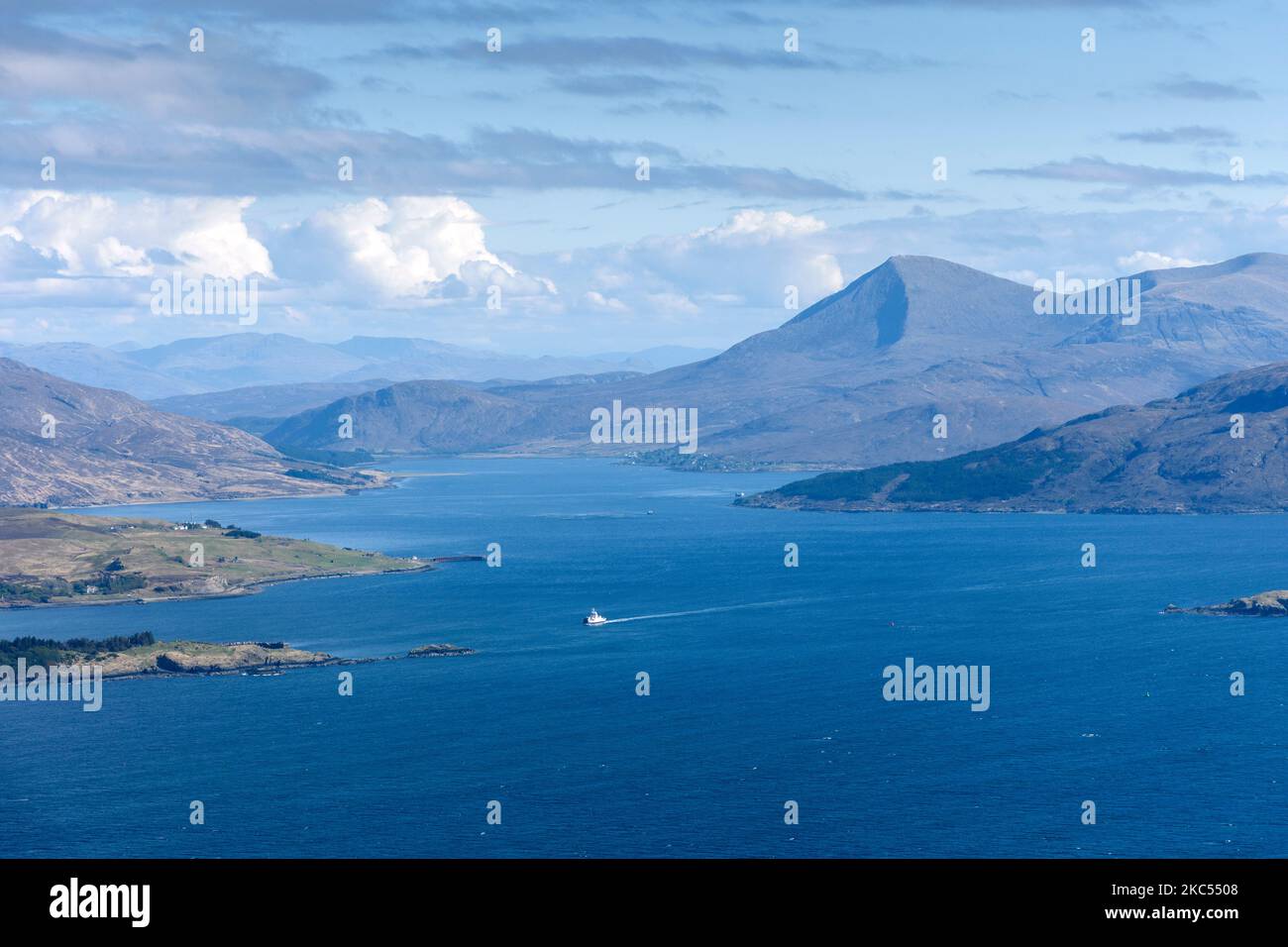 The Raasay ferry crossing the Inner Sound with the Red Cuillin hills ...