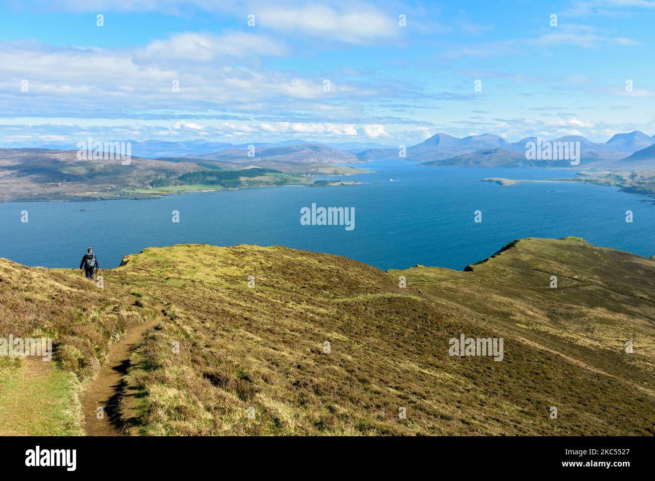 Walker on the south ridge of Ben Tianavaig looking over the Inner Sound ...
