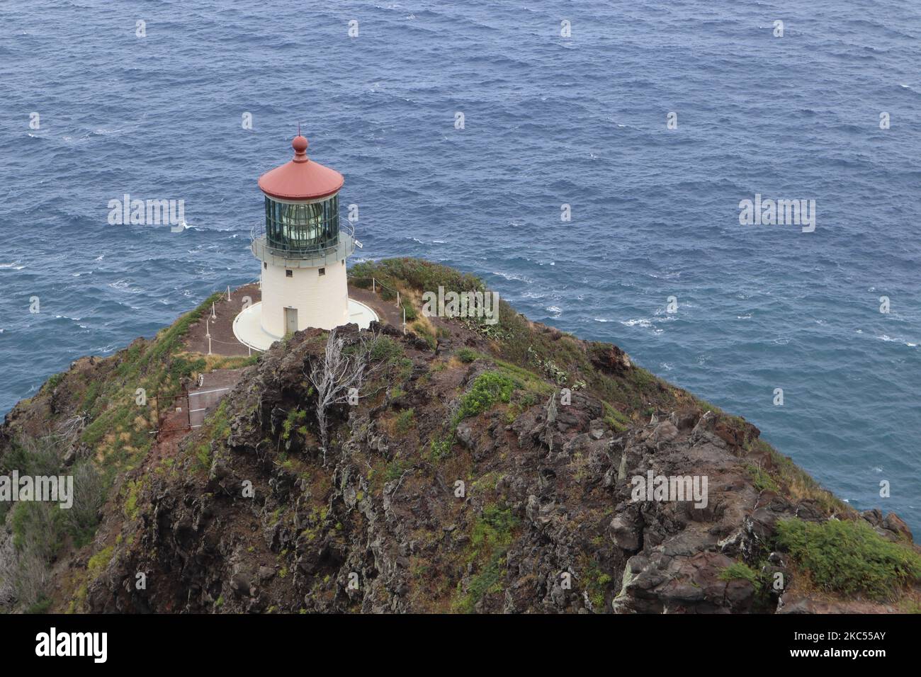 An aerial shot of the Makapu'u Point lighthouse trail on the Hawaiian ...