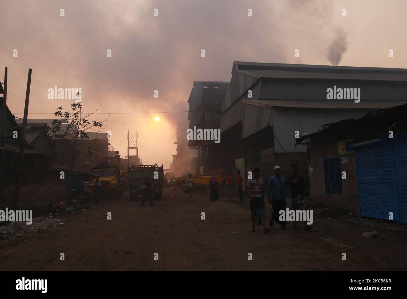 People are seen walking at a smog area in Dhaka, Bangladesh on December ...