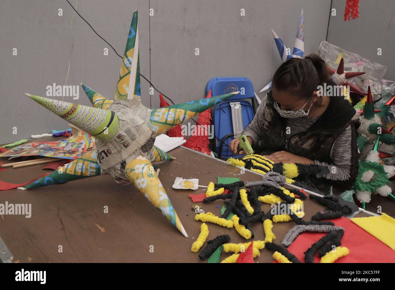 Artisans from Acolman, State of Mexico, make piñatas on the esplanade ...