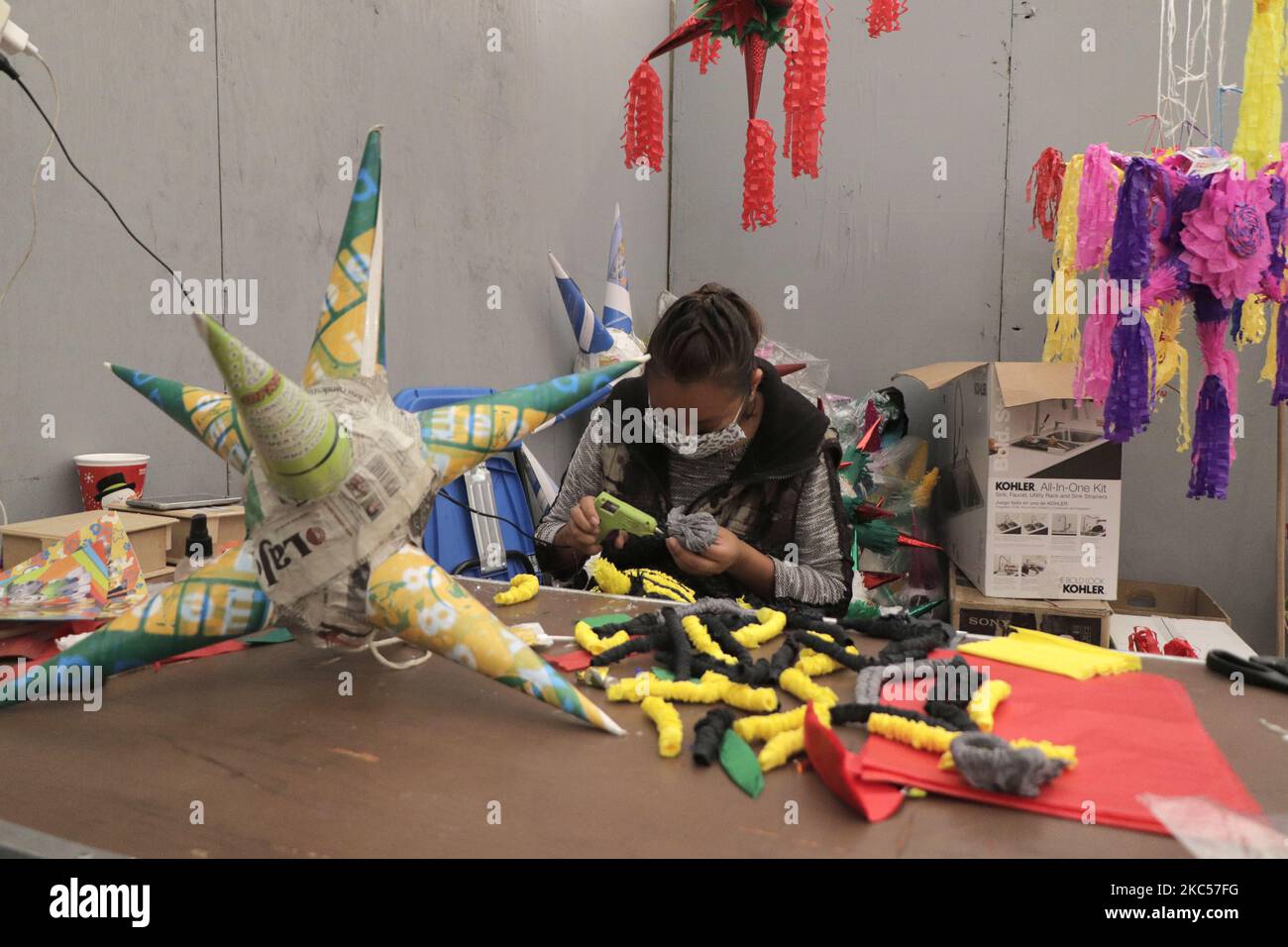 Artisans from Acolman, State of Mexico, make piñatas on the esplanade ...