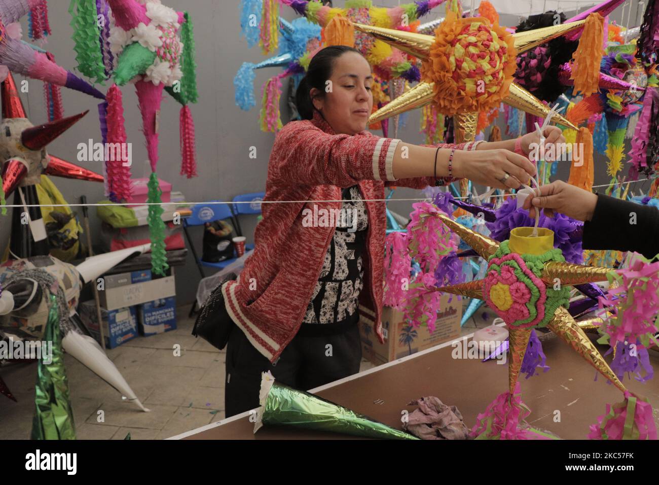 Vendor of piñatas made by artisans from Acolman, State of Mexico, on ...