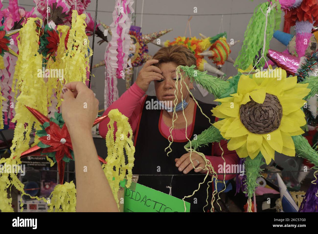 Vendor of piñatas made by artisans from Acolman, State of Mexico, on ...