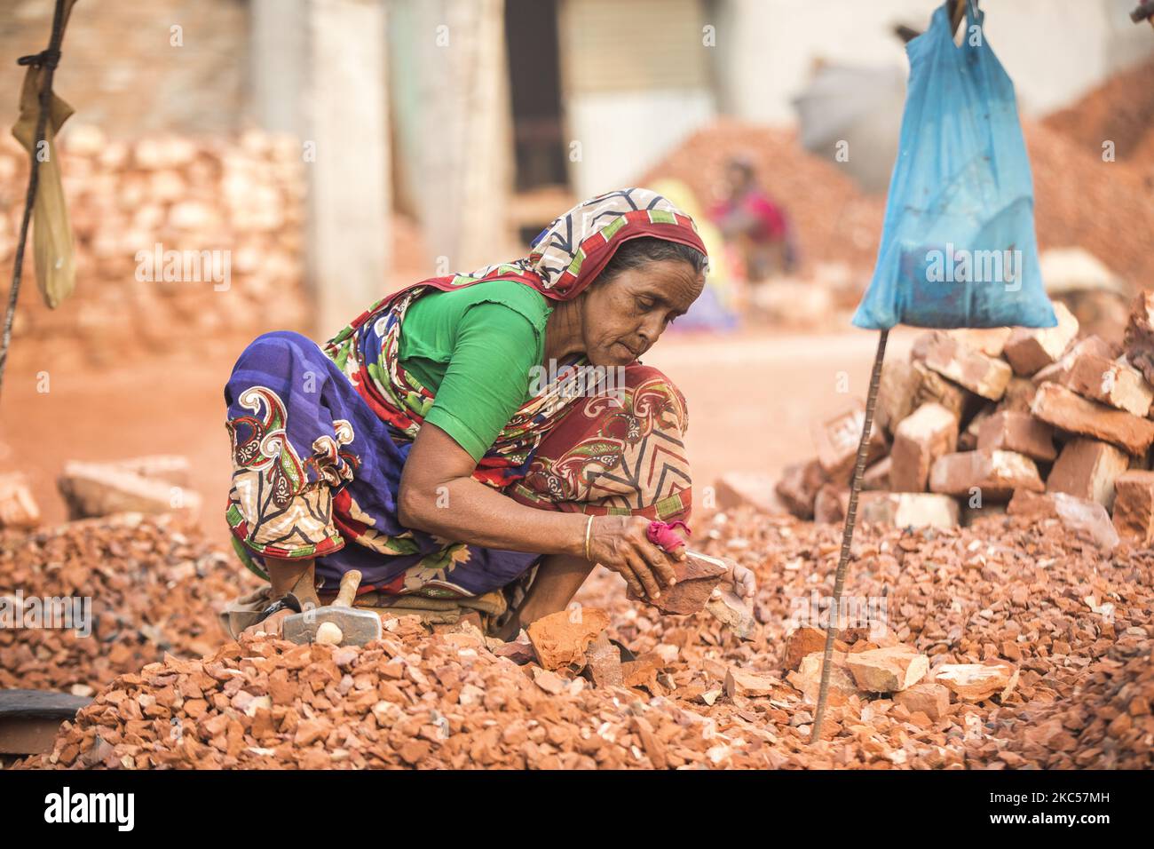 Women break bricks as they earn less-than five dollar for a day in ...