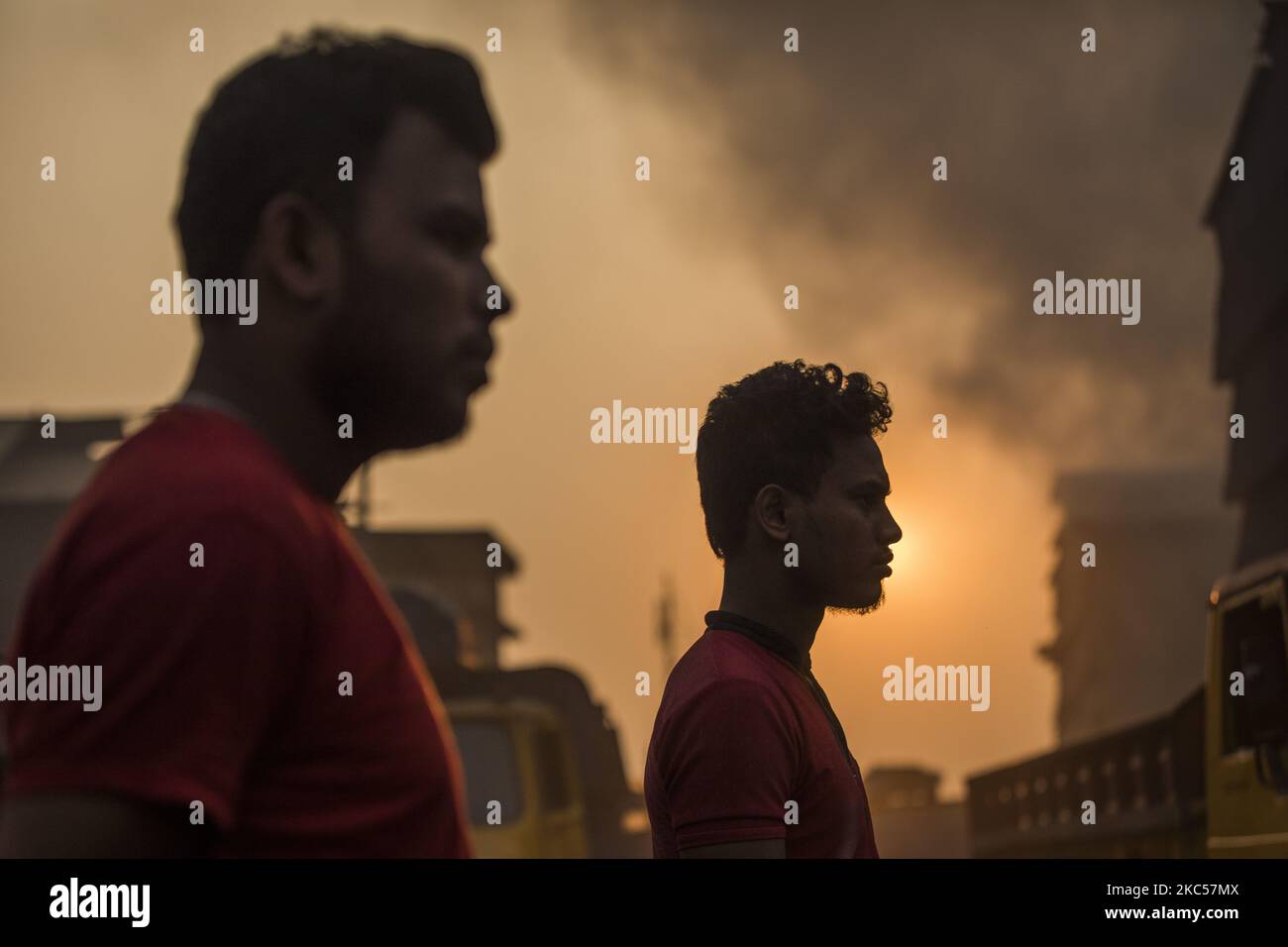 People seen at a smog area in Dhaka, Bangladesh on December 3, 2020 ...