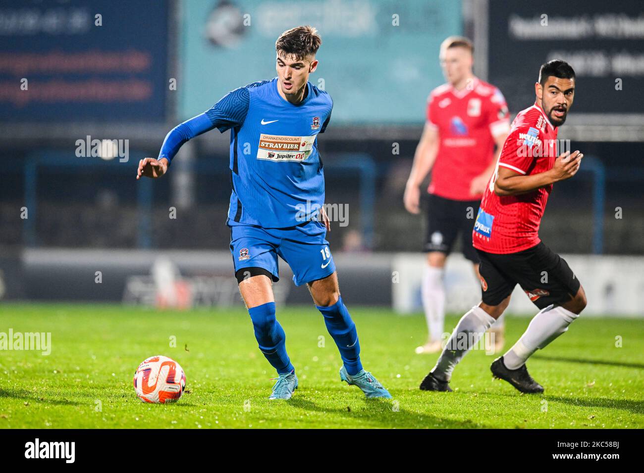 Dender's Nathan Rodes and Rwdm's Barreto Bonato pictured in action ...