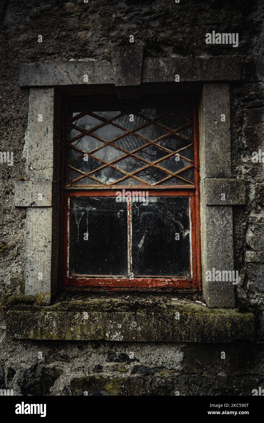 An old dirty glass window of a house Stock Photo - Alamy