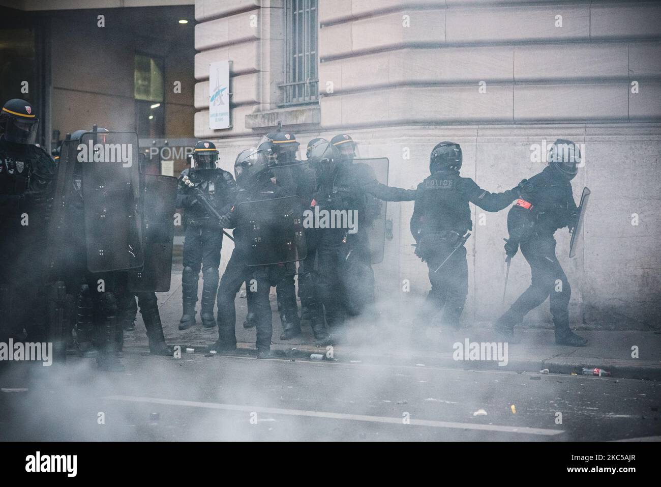 BRAV-M riot police officers are preparing to intervene on a group of ...