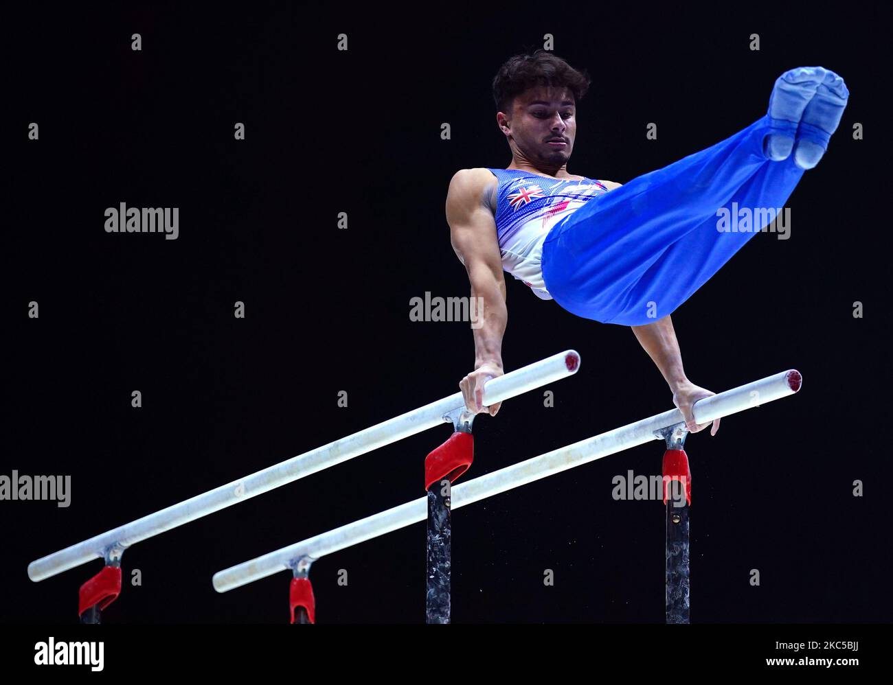 Great Britain's Jake Jarman competing in the Men's Parallel Bars event ...