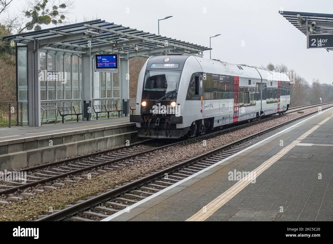 PESA train poperating on a PKM SKM line at the Kielpinek train station ...
