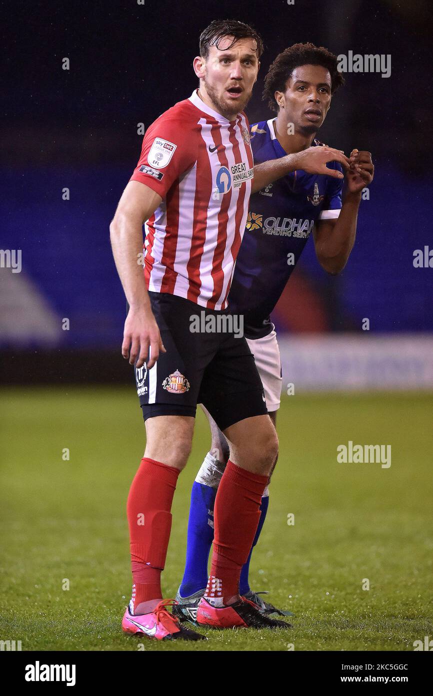 Oldham Athletic's Sido Jombati tussles with Sunderland's Charlie Wyke ...