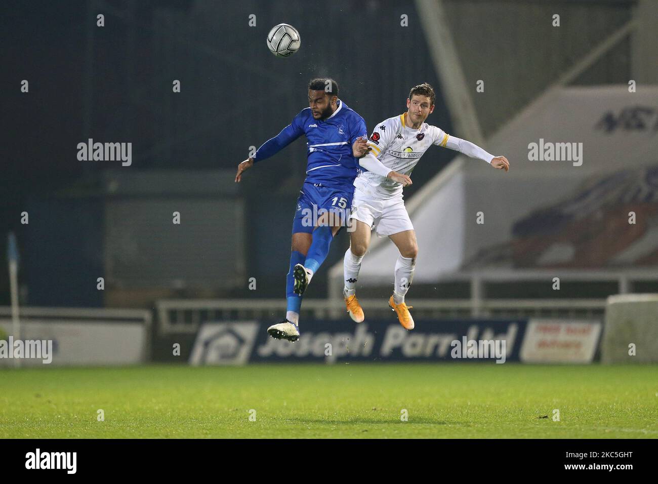 Ryan Johnson of Hartlepool United contests a header with Adam Marriott ...
