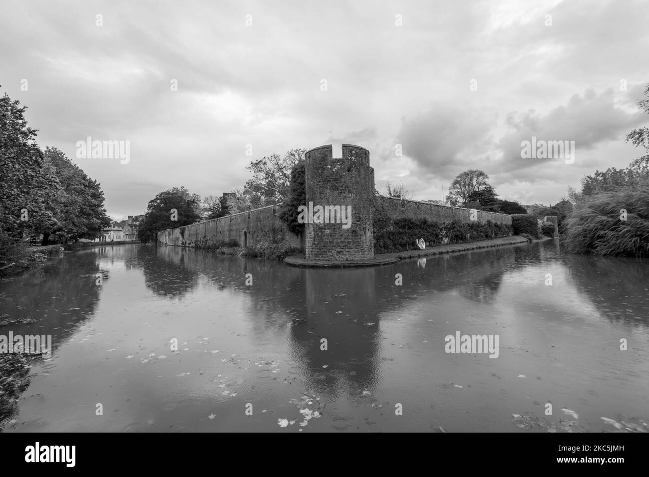 Black and white photo of the moat and boundary wall around the Bishops ...
