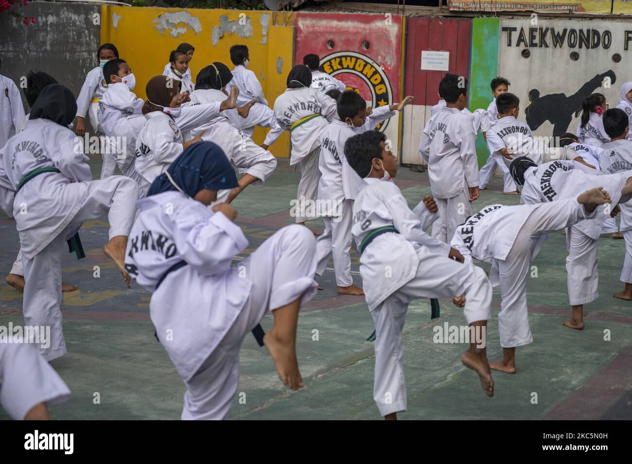 Children take part in training at one of the Taekwondo sports clubs in ...