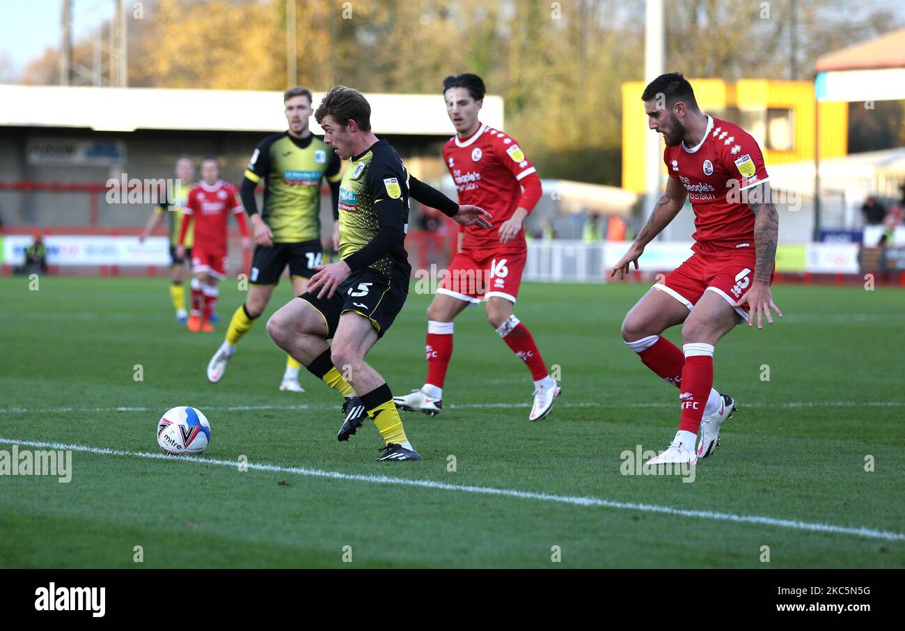 Tom Dallison-Lisbon of Crawley Town and Luke James of Barrow during the ...
