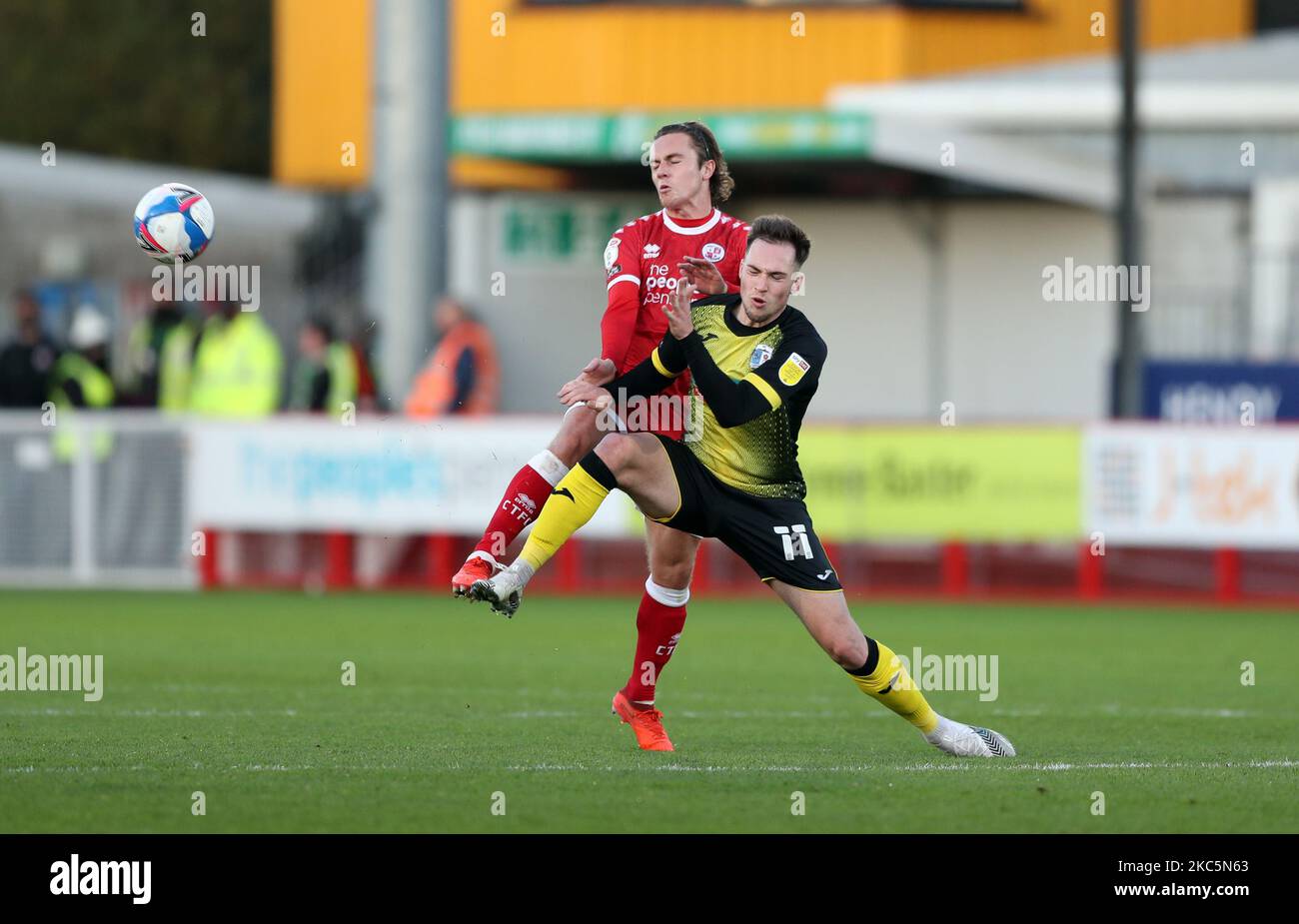 Sam Matthews of Crawley Town and Josh Kay of Barrow during the Sky Bet ...