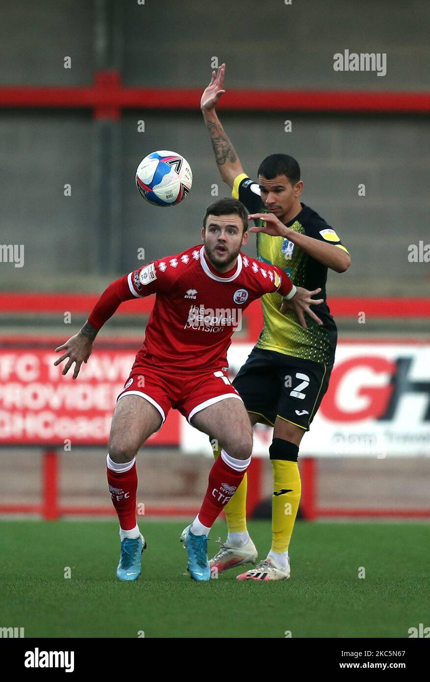 Tyler Frost of Crawley Town and Connor Brown of Barrow during the Sky ...