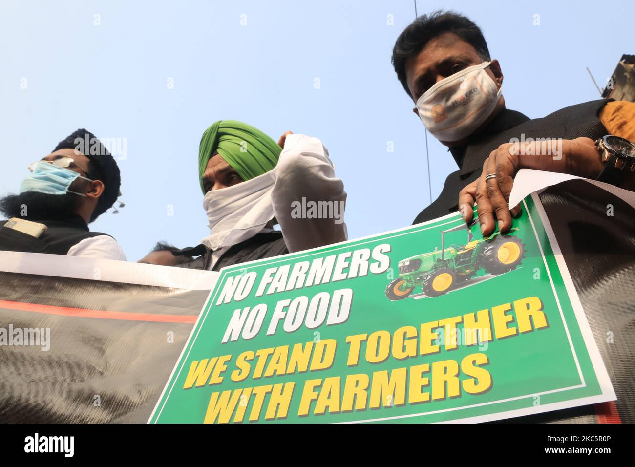 People take part in rally against the newly passed Farm Bills and ...