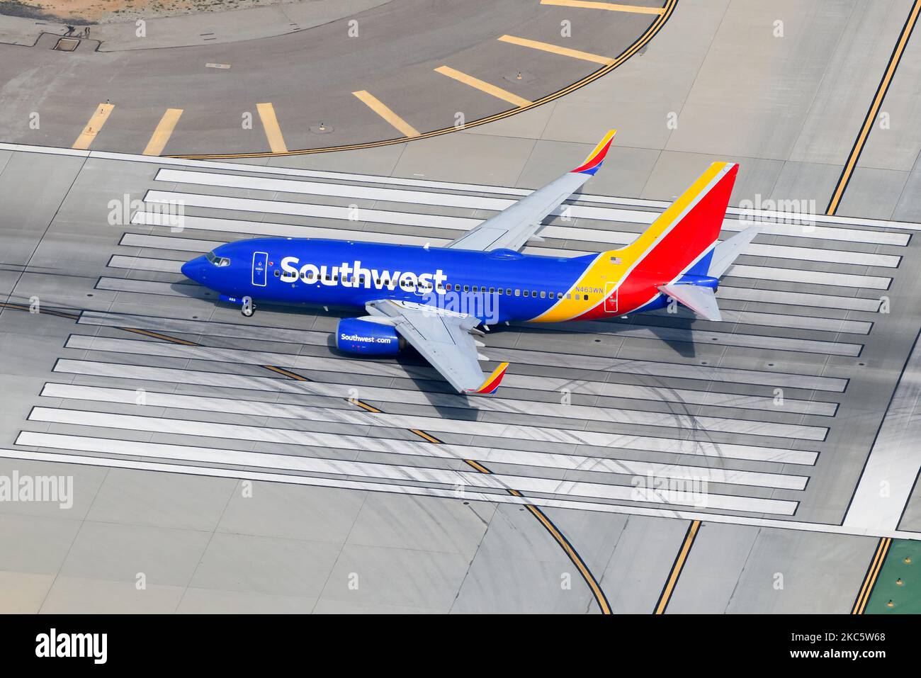 Southwest Boeing 737 airplane about to depart from airport runway ...