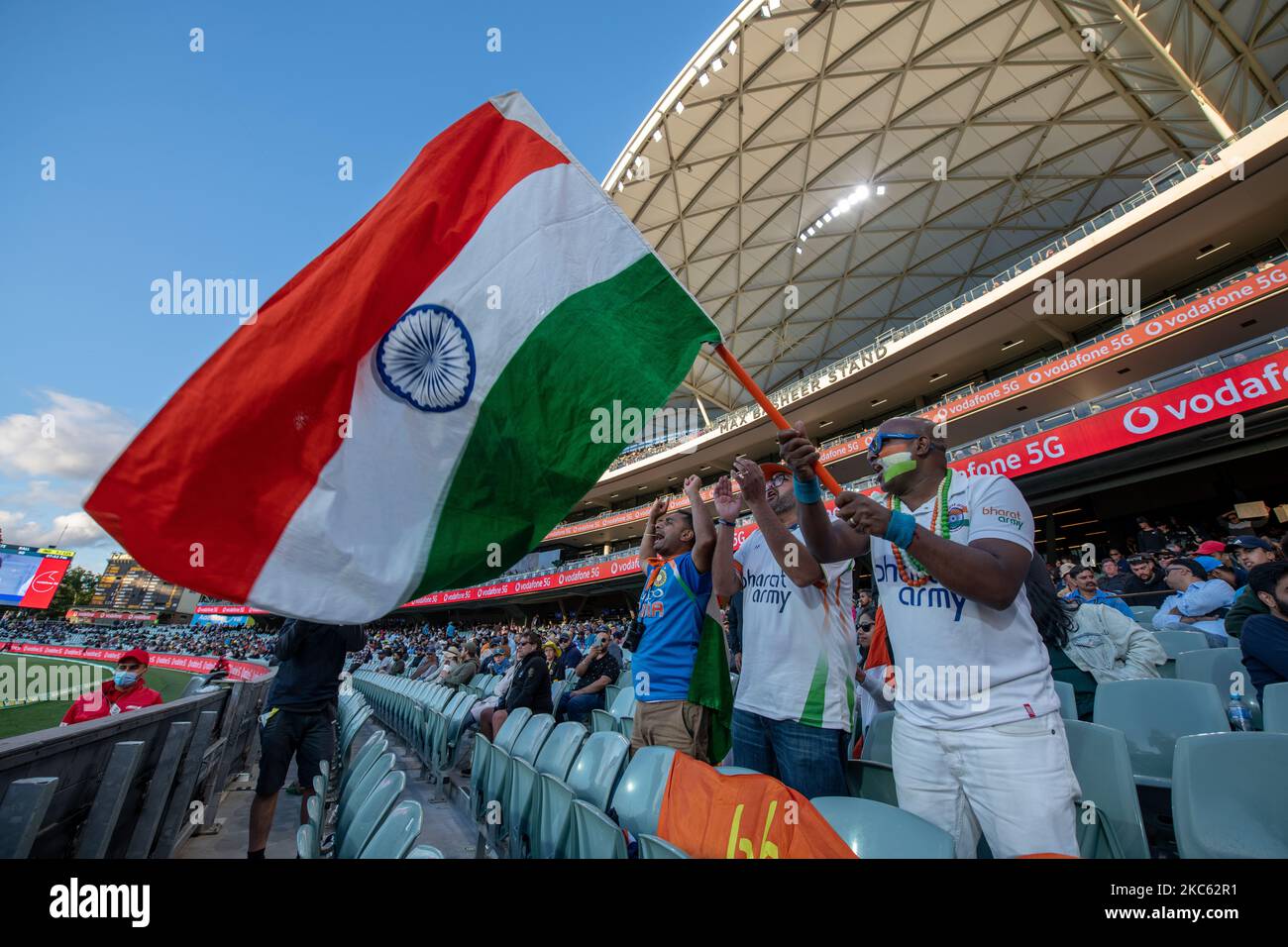 Indian Cricket fan waive the Indian flag during day one of the First ...