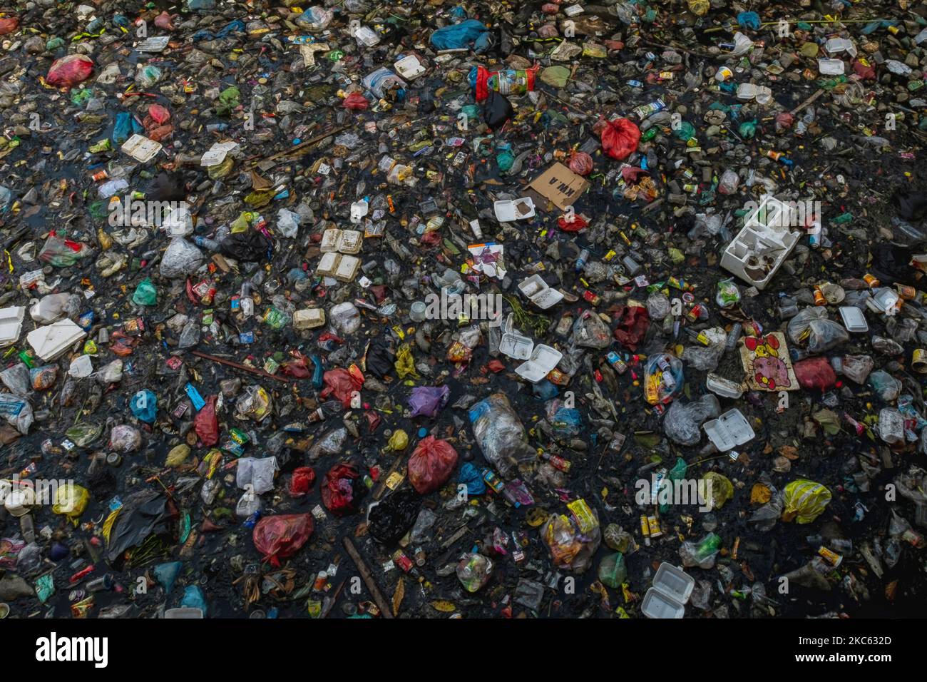 Photo shows floating plastic and styrofoam trash polluting a corner of ...