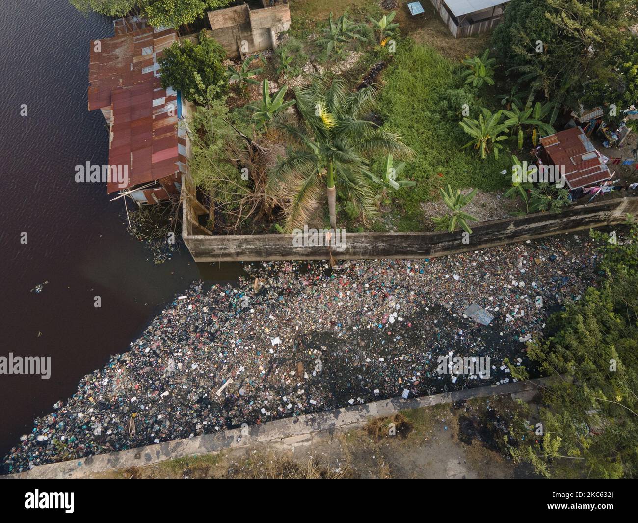 Aerial photo shows floating plastic and styrofoam trash polluting a ...