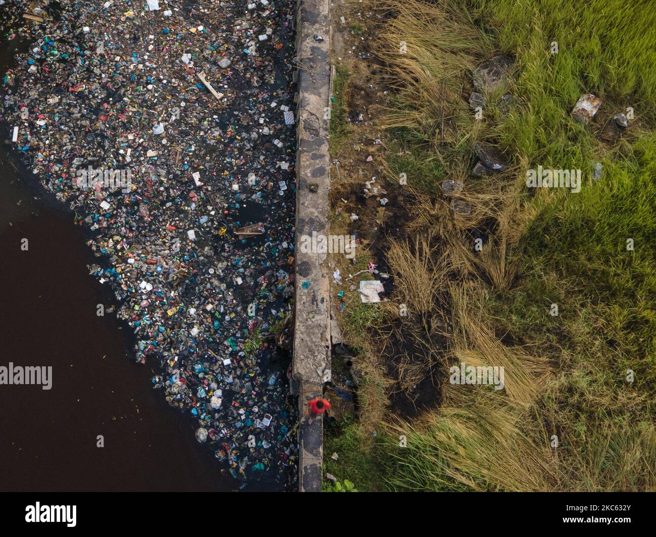 Aerial photo shows floating plastic and styrofoam trash polluting a ...