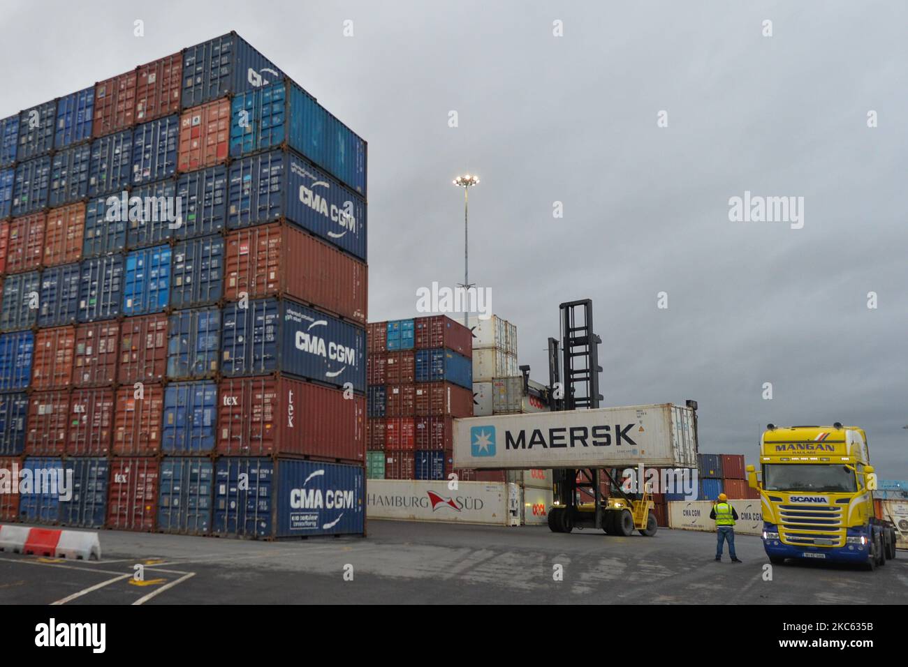A track being loaded inside a container depot at Dublin Port. On ...