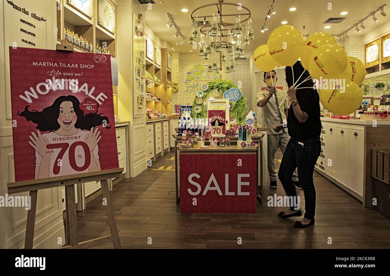 Advertising a sale and discounts of 70 percent at a shop in Botani ...