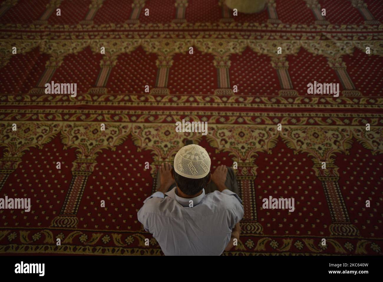 A Nepalese Muslim offer Friday ritual prayer after nine months in ...