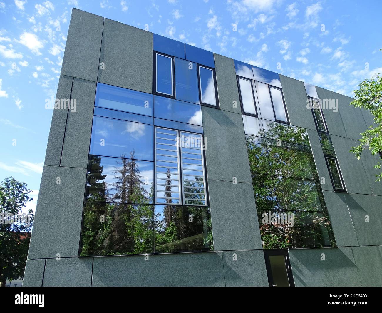 Trees reflected in glass windows hi-res stock photography and images ...