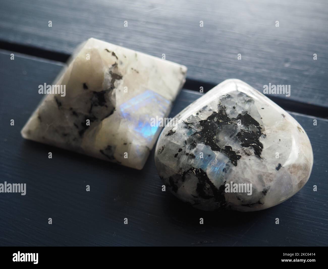 Moonstone with Black and Rainbow Inclusions Stock Photo - Alamy