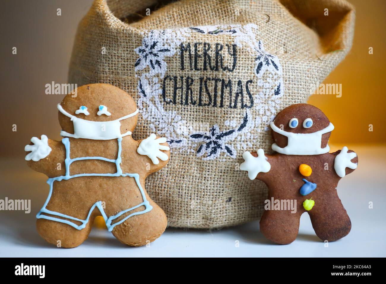 Gingerbread men wearing surgical face masks, baked by a local ...