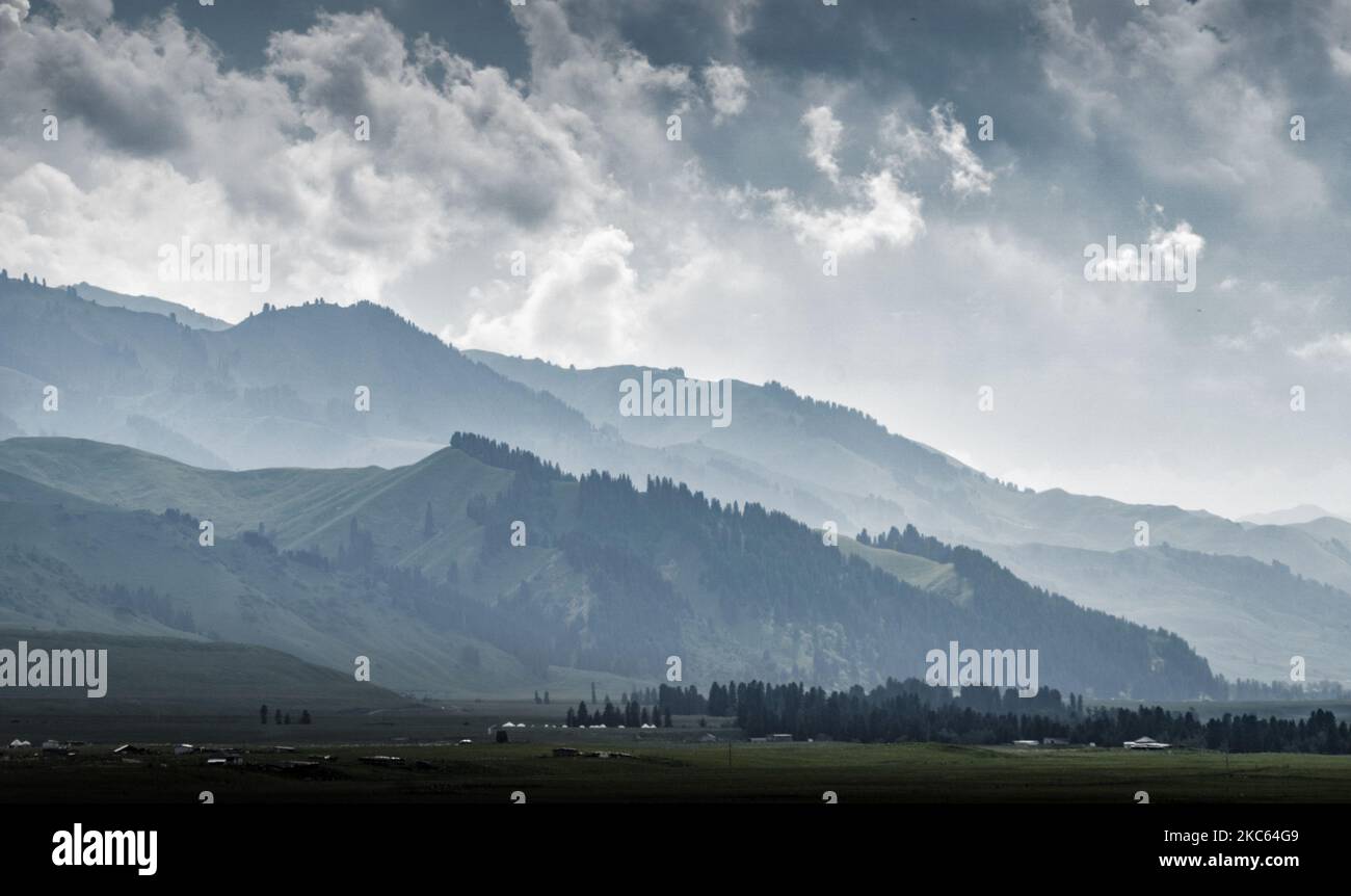 The layers of mountain ranges and forests Stock Photo - Alamy