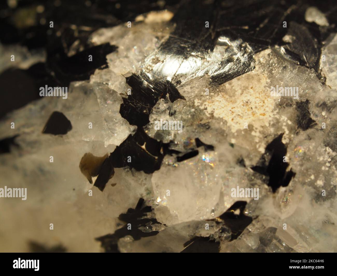 Moonstone with Black and Rainbow Inclusions Stock Photo - Alamy