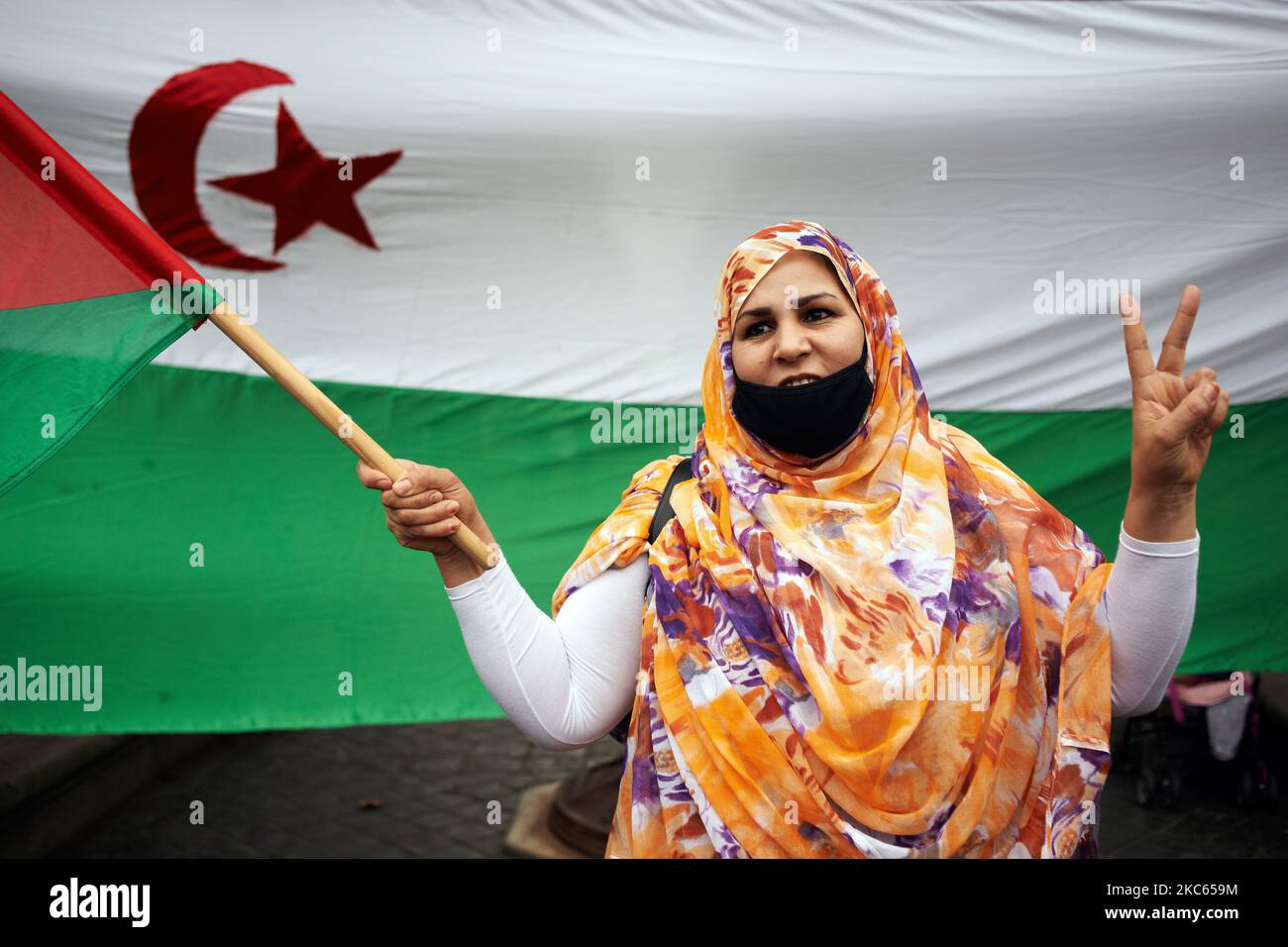 A woman reacts. Sahrawi people of Toulouse gathered against the ...